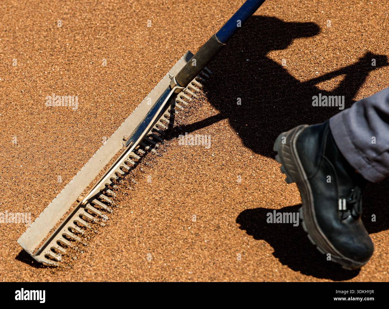 GUADALAJARA, MEXICO - JANUARY 31: Detail of a rake and the shadow of a ...