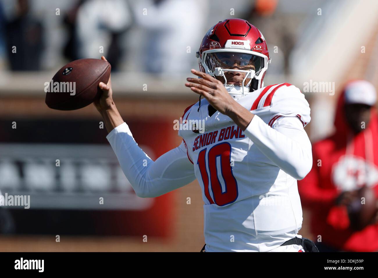 American Team quarterback Taylen Green (10), of Arkansas, warms up ...