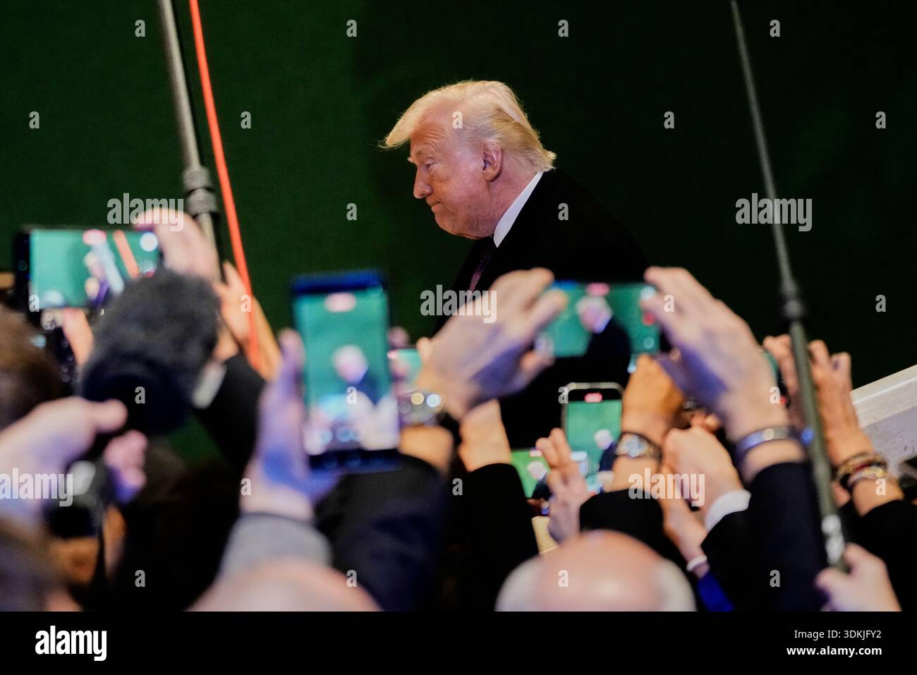 FILE - U.S. President Donald Trump is photographed by a gaggle of ...