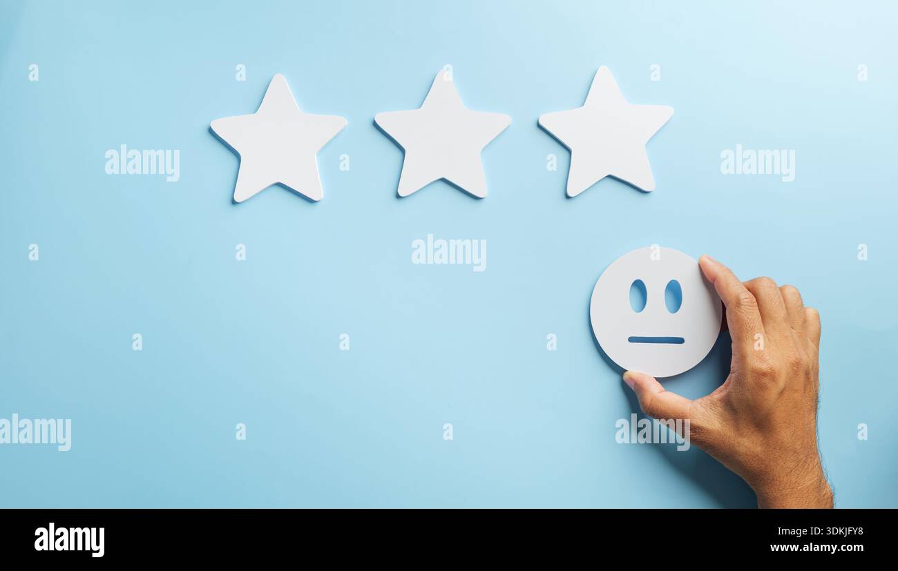 Customer feedback concept, hand selecting neutral face emoji icon for ...