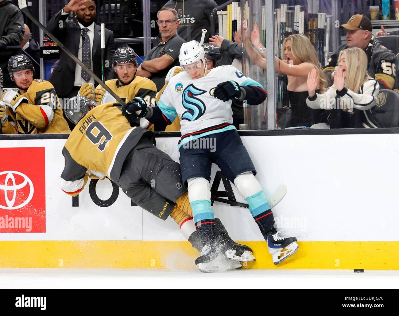 Vegas Golden Knights center Jack Eichel (9) is checked by Seattle ...