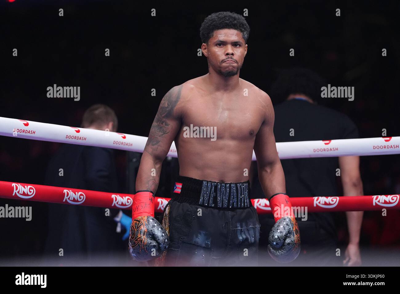 Shadur Stevenson waits for the start of a super lightweight title ...