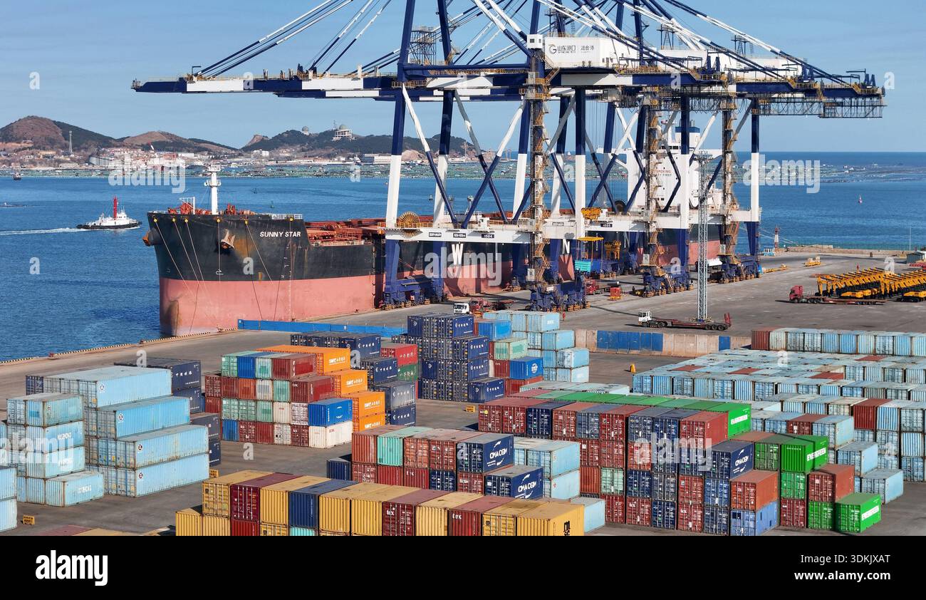 YANTAI, CHINA - JANUARY 30, 2026 - A cargo ship was loading and ...