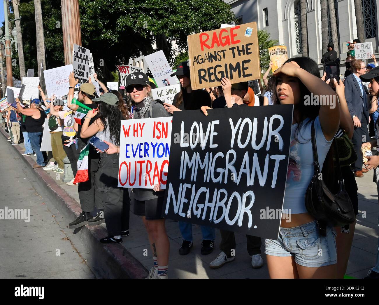 Hundreds gather for the "Ice Out of Everywhere" protest at City Hall in ...