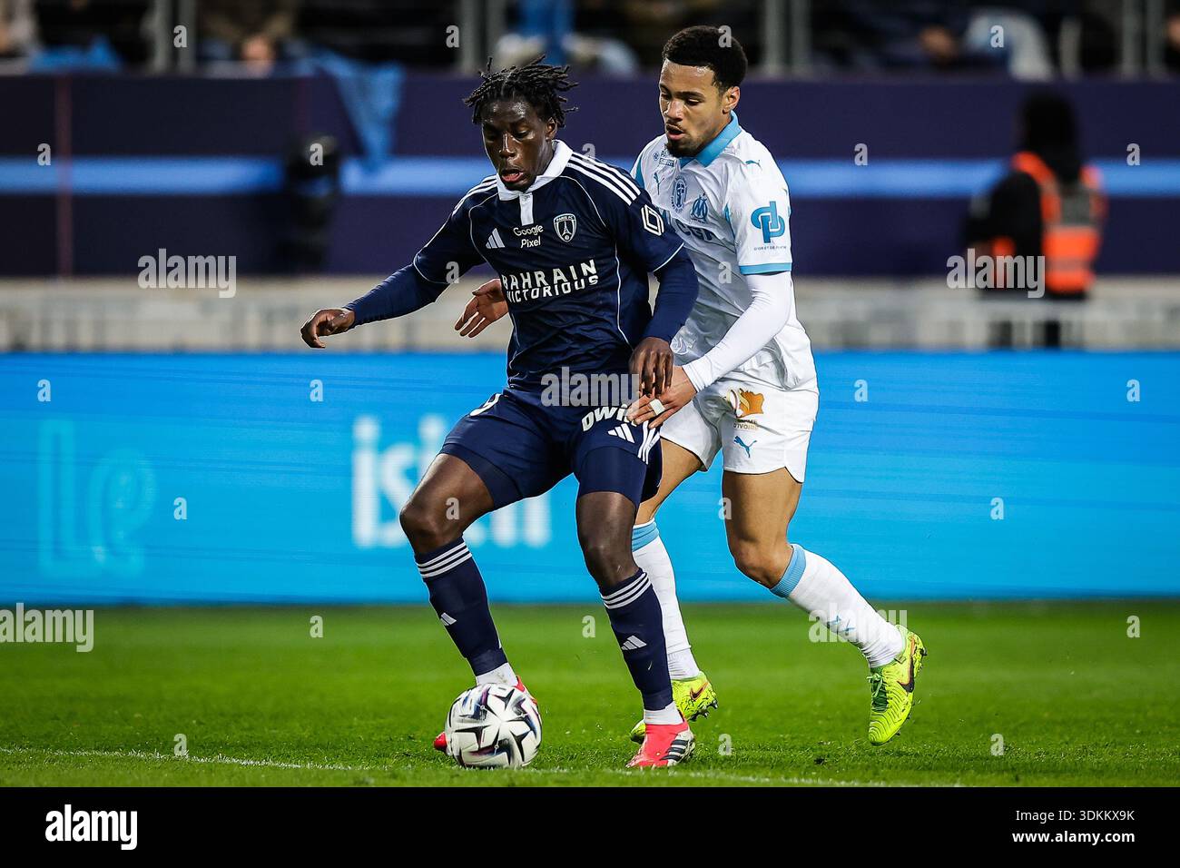 Nhoa SANGUI of Paris FC and Ethan NWANERI of Marseille during the ...
