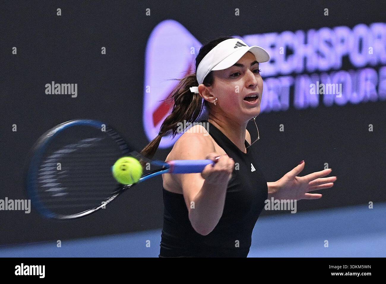 Elina Avanesyan of Armenia returns a ball to Moyuka Uchijima of Japan ...
