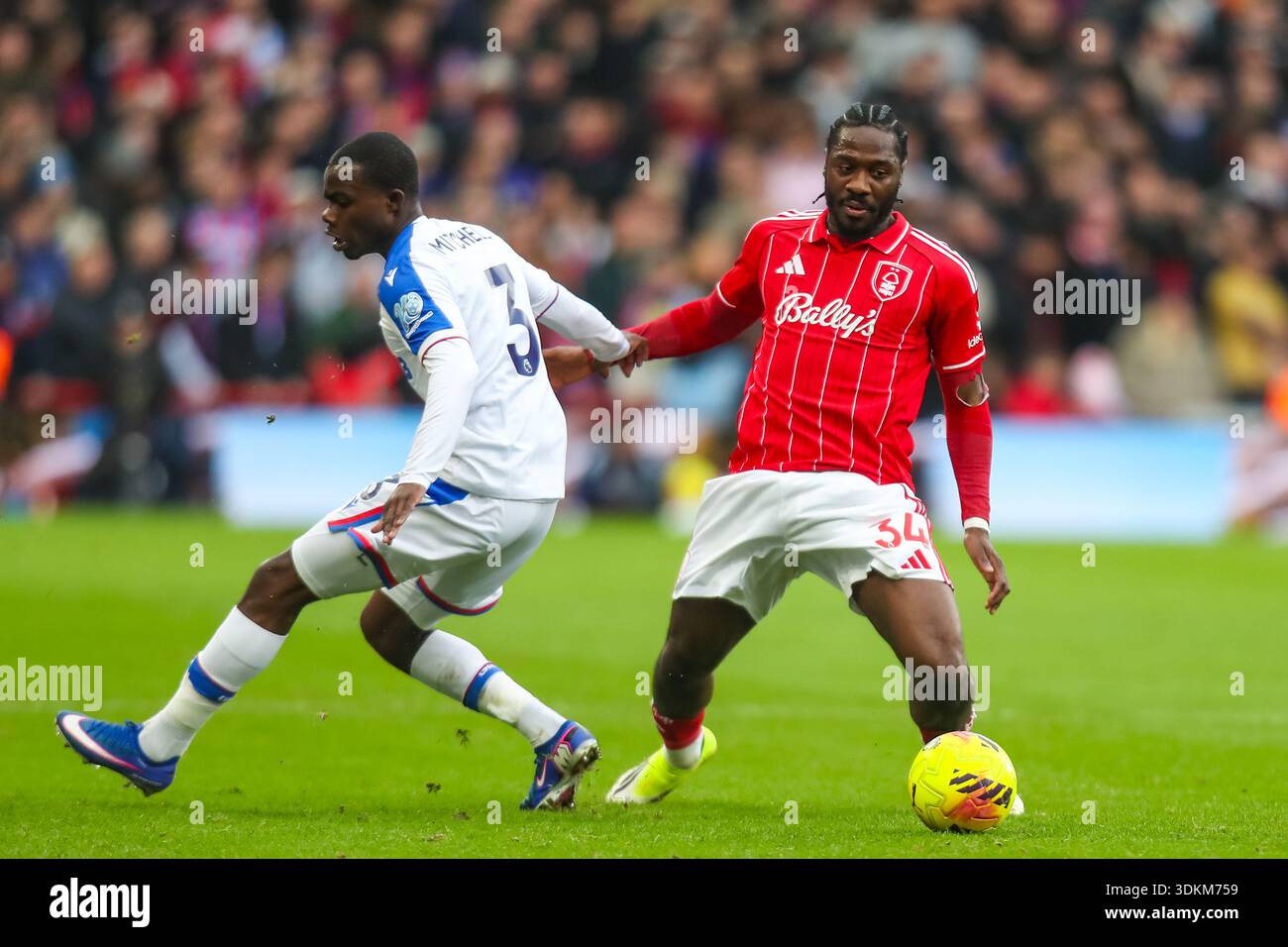 Crystal Palace's Tyrick Mitchell (left) and Nottingham Forest's Ola ...