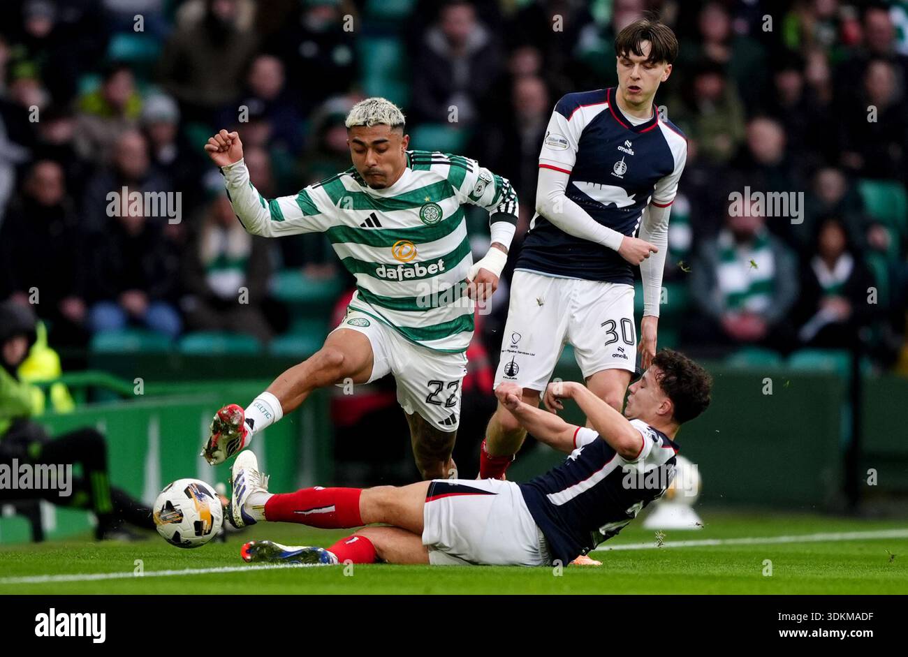 Celtic's Julian Araujo (left) and Falkirk's Dylan Tait battle for the ...