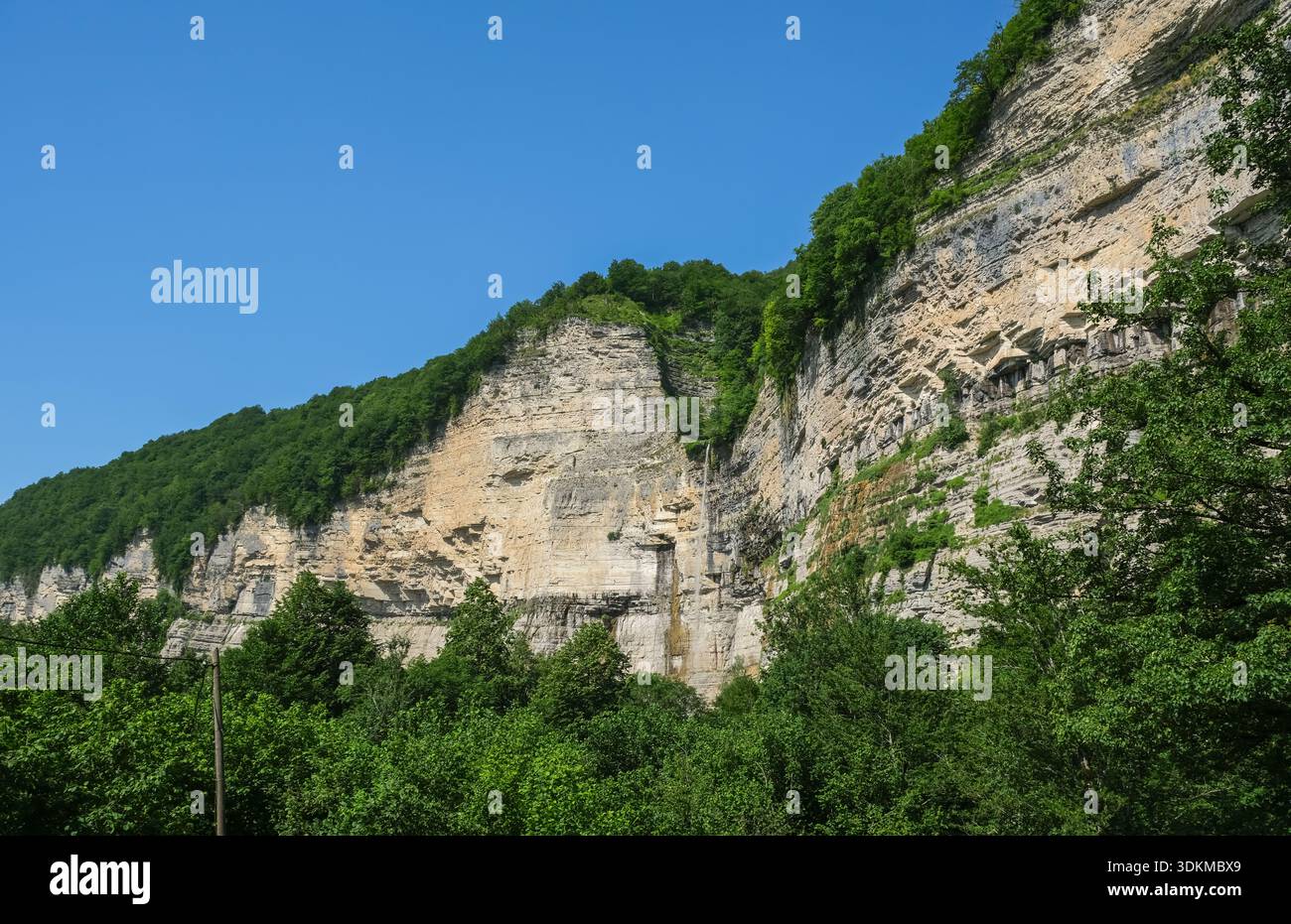 Towering limestone cliffs in western Georgia form an amphitheater wall ...