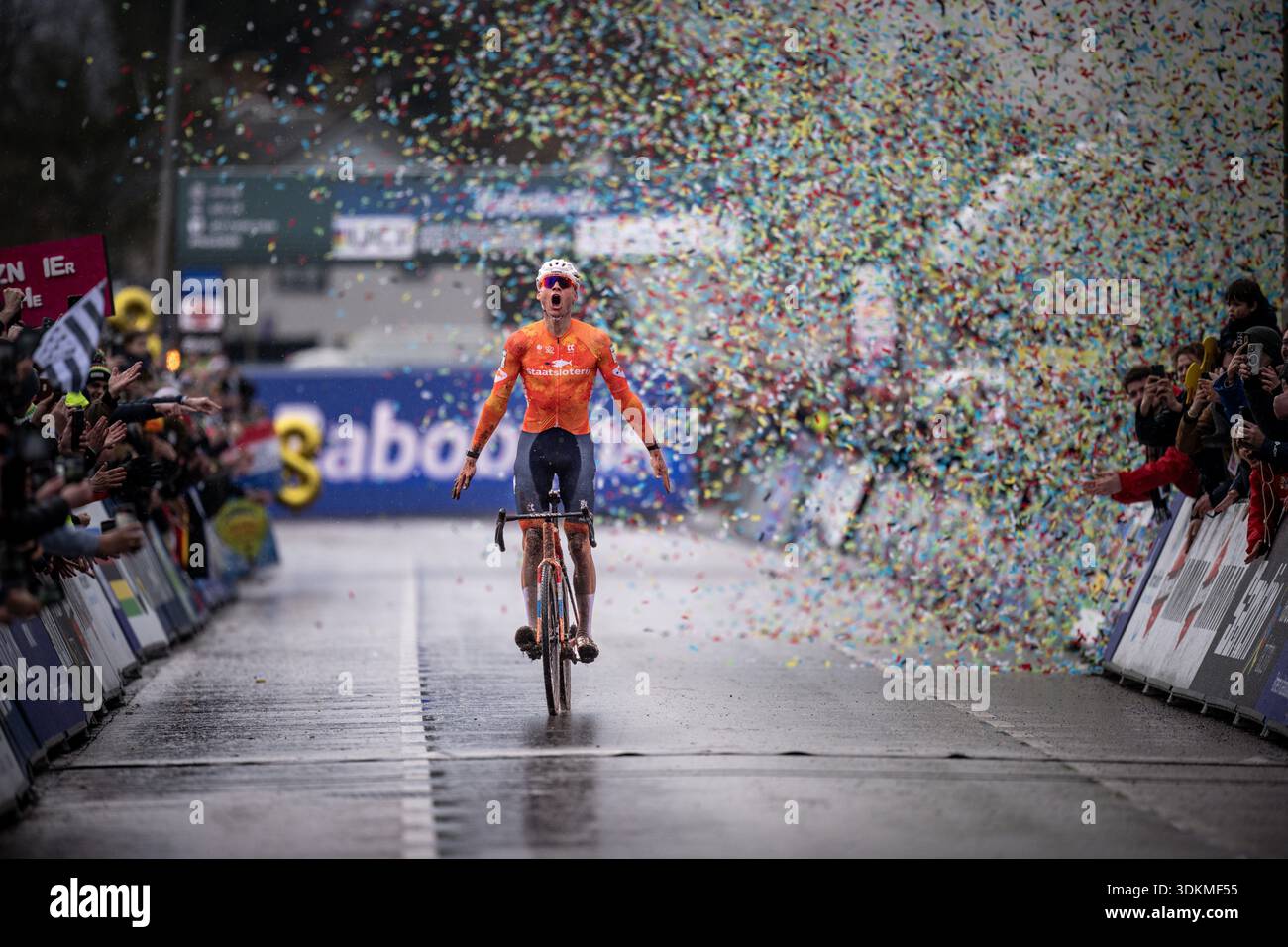 Dutch Mathieu van der Poel celebrates as he crosses the finish line to ...