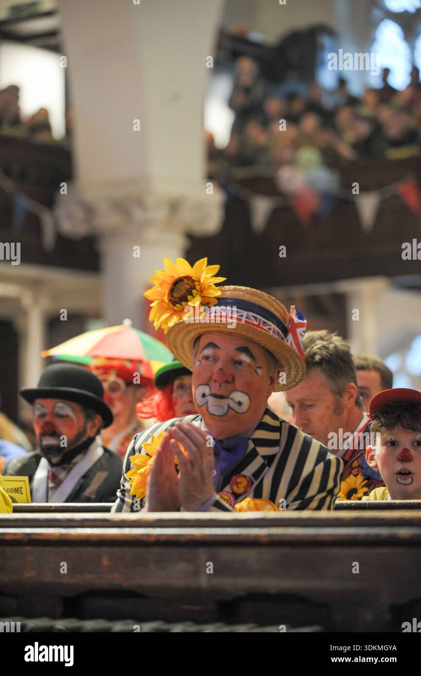 Clowns in vivid costume fill All Saints Trinity Church for the 80th ...