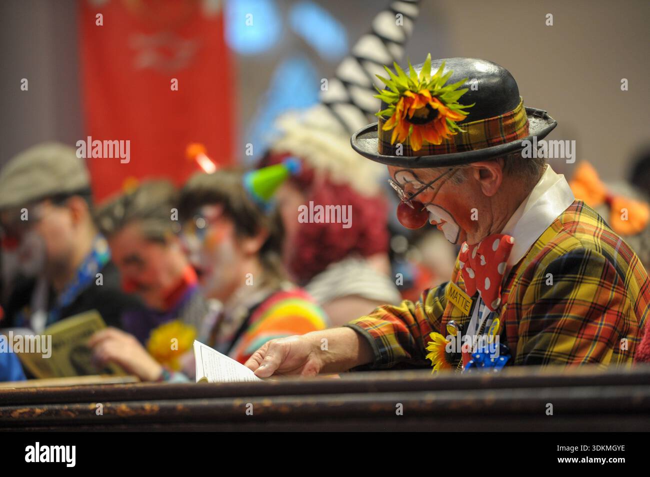 Clowns in vivid costume fill All Saints Trinity Church for the 80th ...