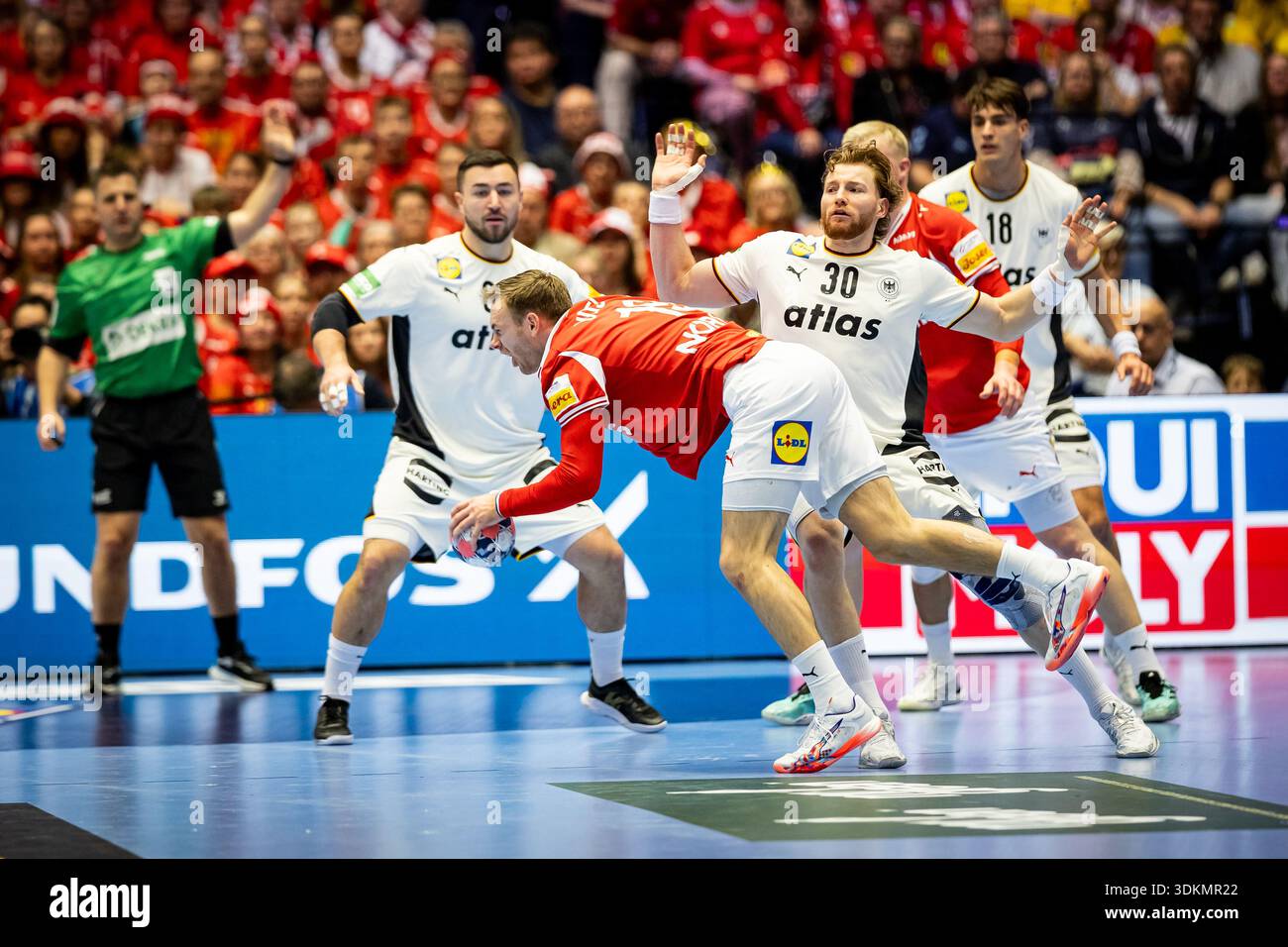 HERNING, DENMARK - FEBRUARY 1: Foul from Tom Kiesler (Germany, 30) at ...