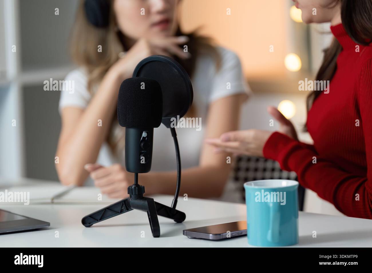 Wearing radio microphone hi-res stock photography and images - Alamy