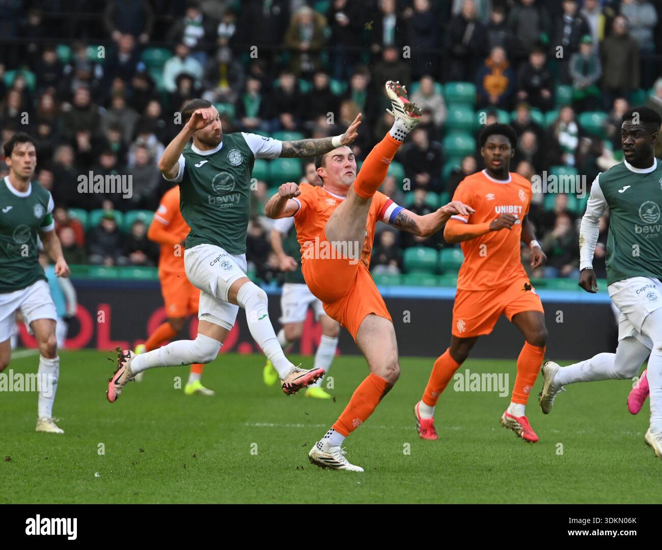 John souttar rangers clears from martin boyle of hibs hi-res stock ...