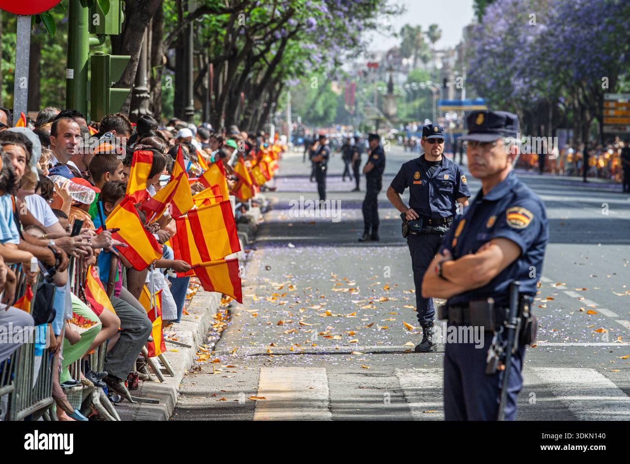 Spanish National Police officers diligently monitor the route during ...