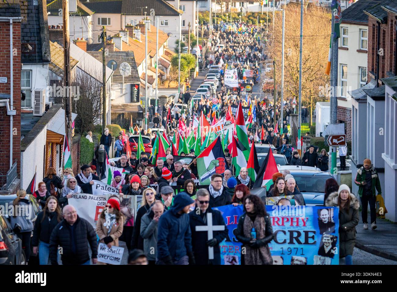 Derry, Northern Ireland. 1 February 2026. Marchers walk during the ...
