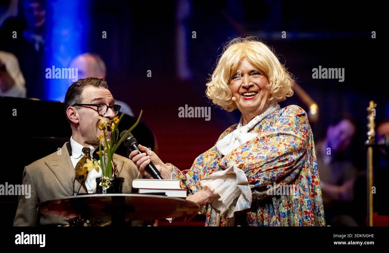 AMSTERDAM – Paul Haenen on stage with Benjamin Herman during an ...
