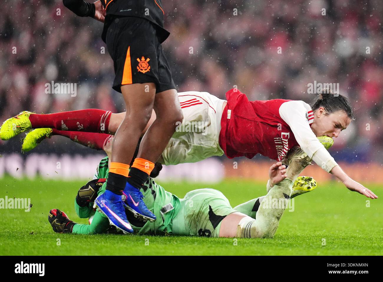 Arsenal goalkeeper Anneke Borbe collides with Lotte Wubben-Moy during ...