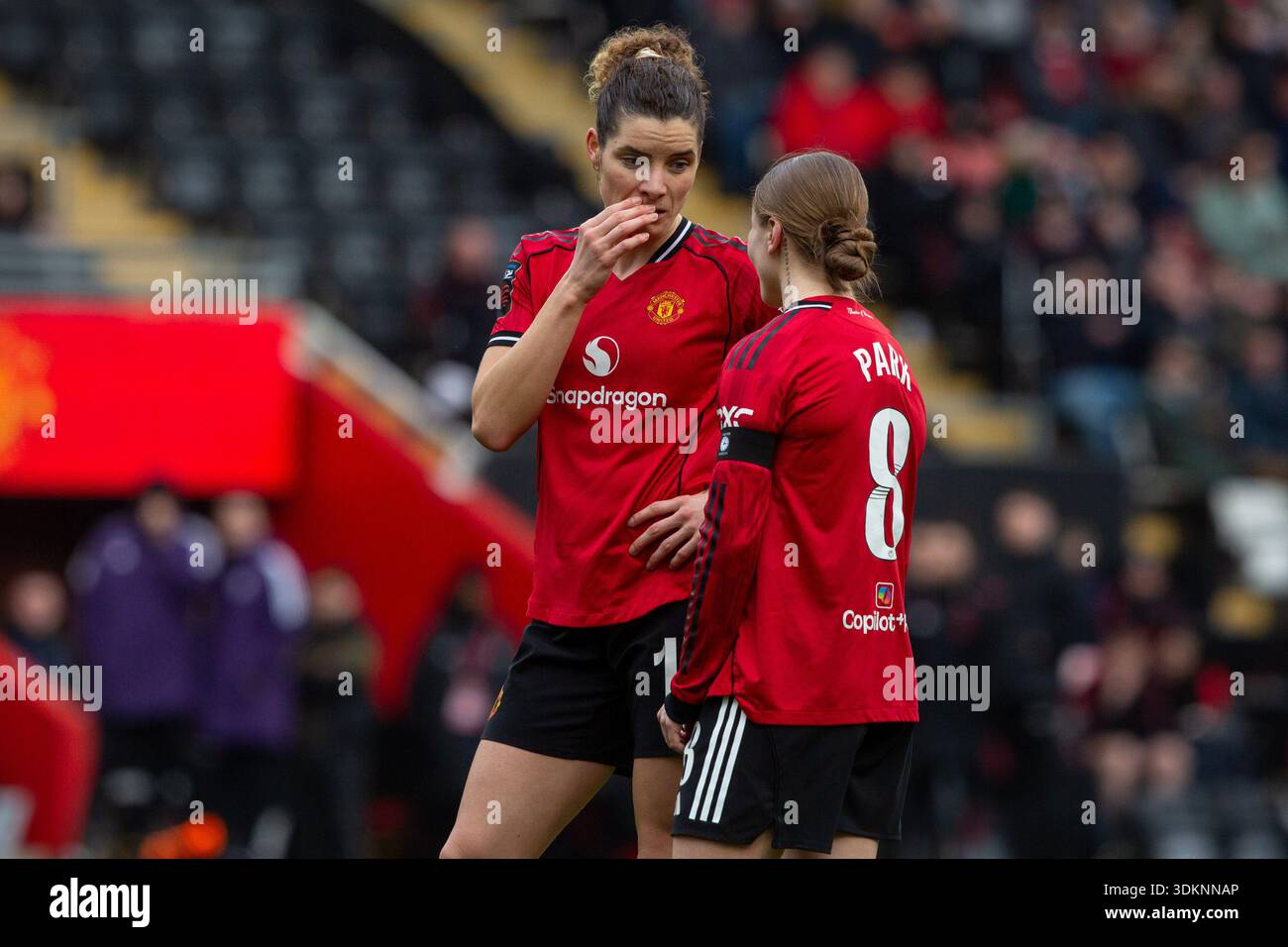 Dominique Janssen (17 Manchester United) speaks to Jess Park (8 ...