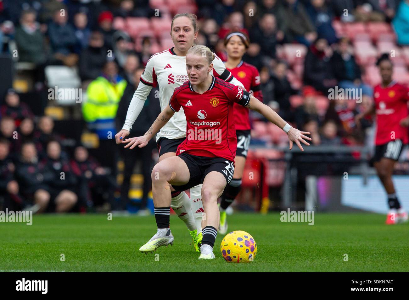 Anna Sandberg (2 Manchester United) shields the ball back to the ...