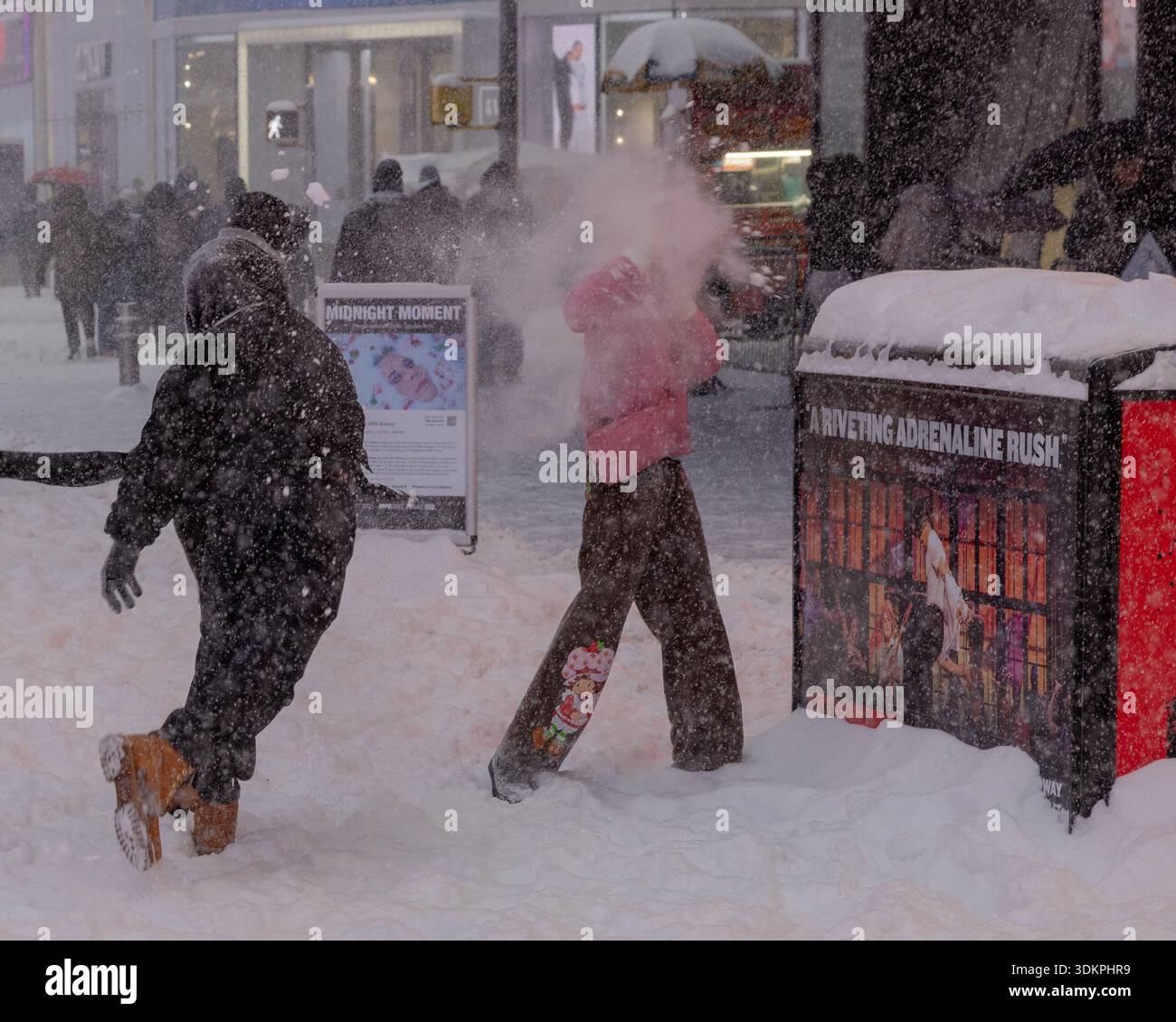 With people playing snow in times square new york hi-res stock ...