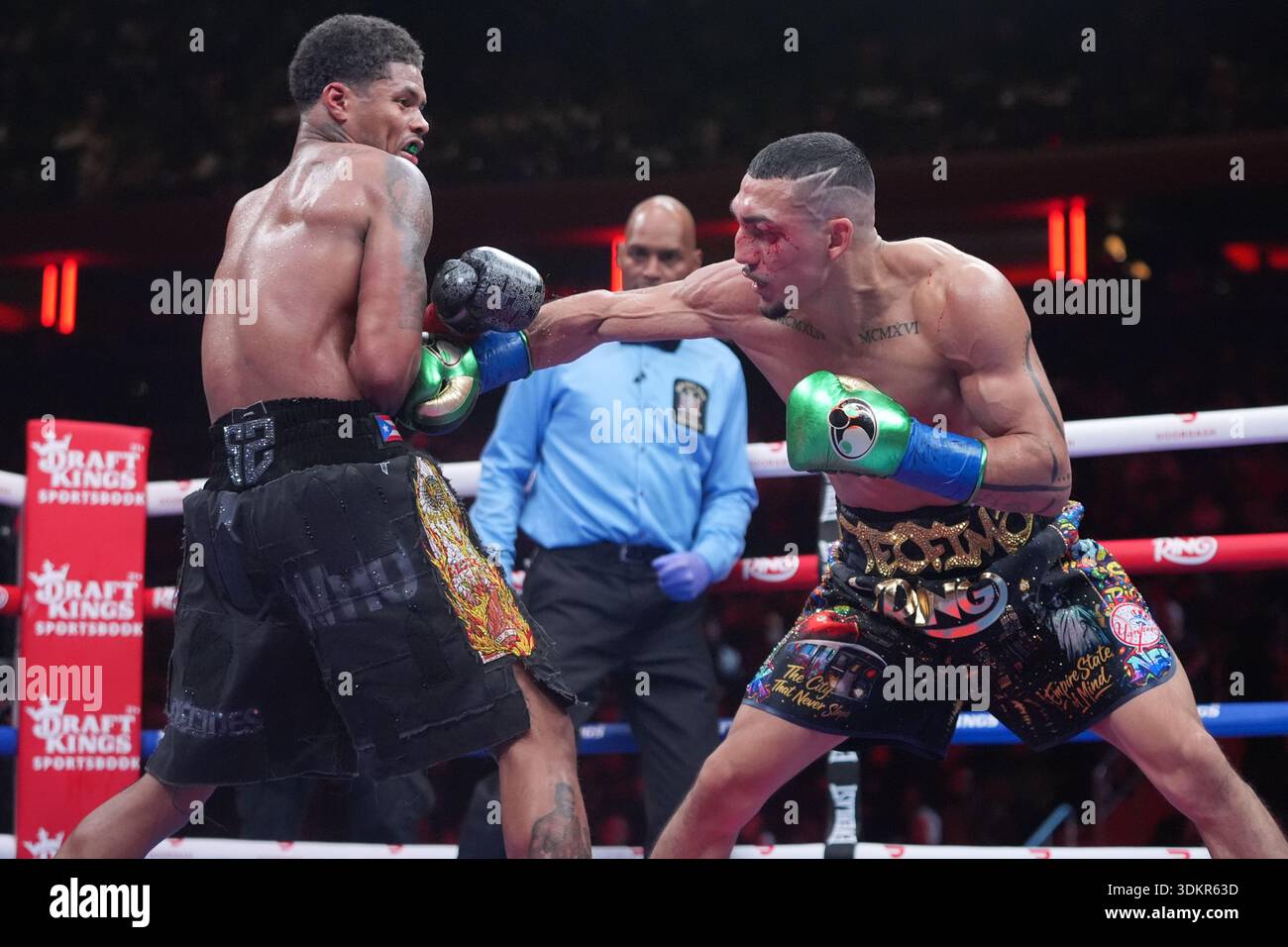 Teofimo Lopez, right, punches Shakur Stevenson during a super ...
