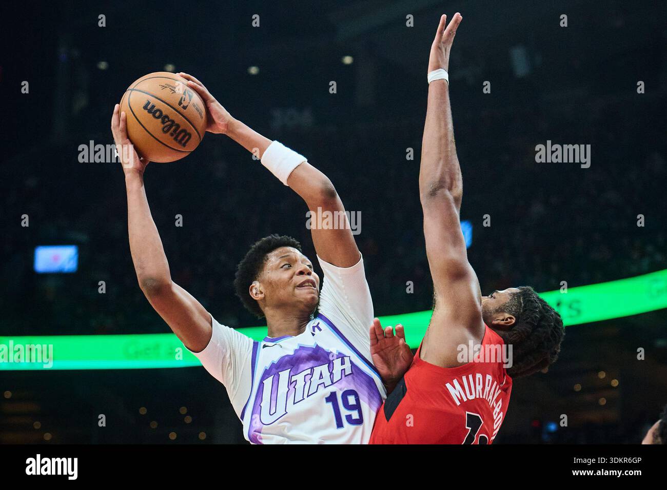 Utah Jazz's Ace Bailey (19) is blocked on a drive to the net by Toronto ...