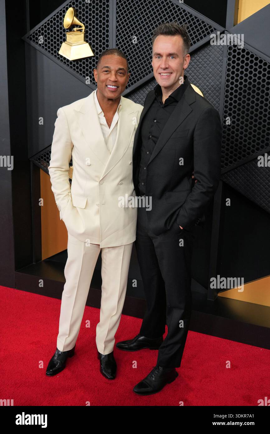 Don Lemon, left, and Tim Malone arrive at the 68th annual Grammy Awards ...