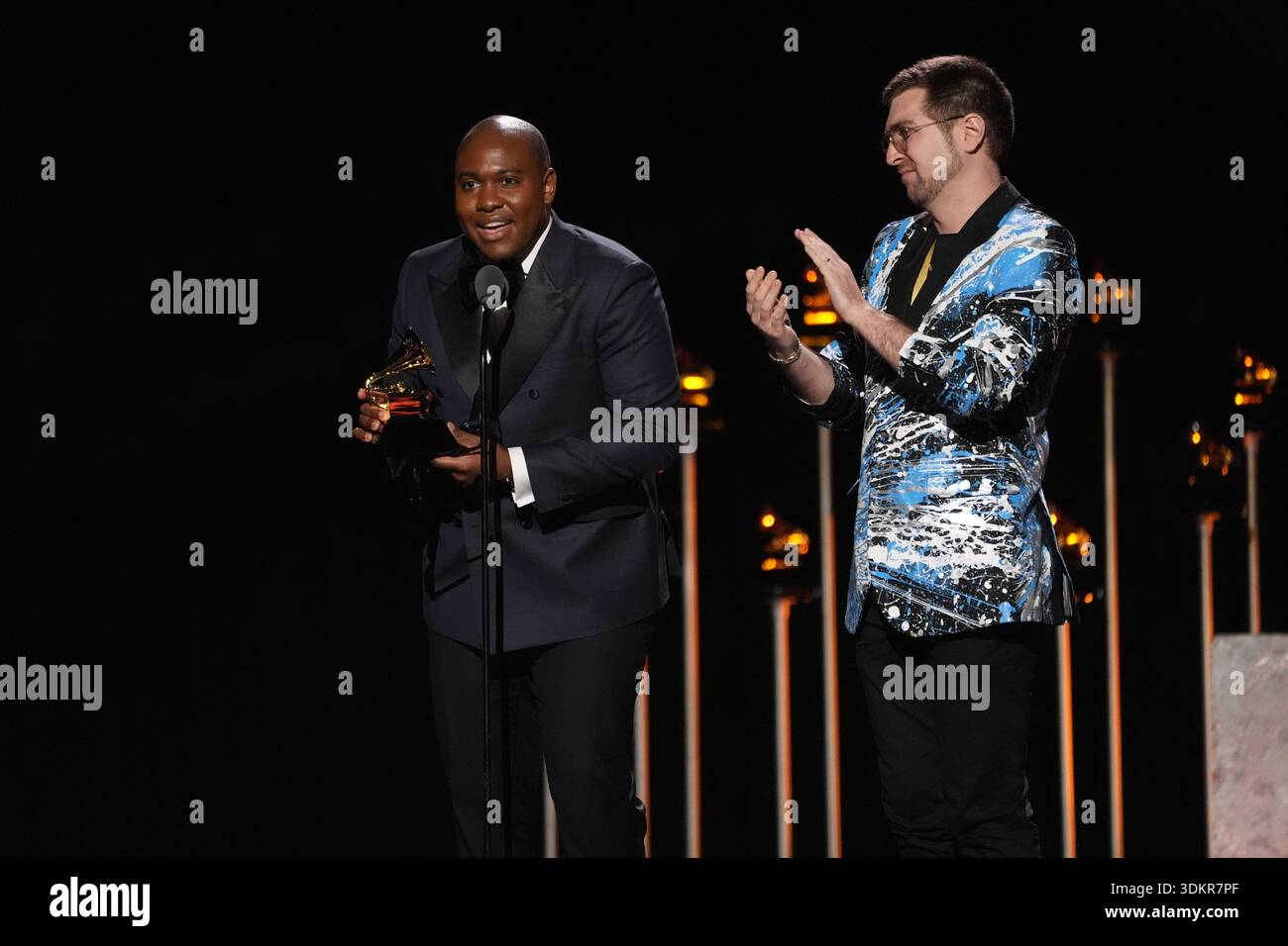 Bryan Carter, left, and Charlie Rosen accept the award for best ...