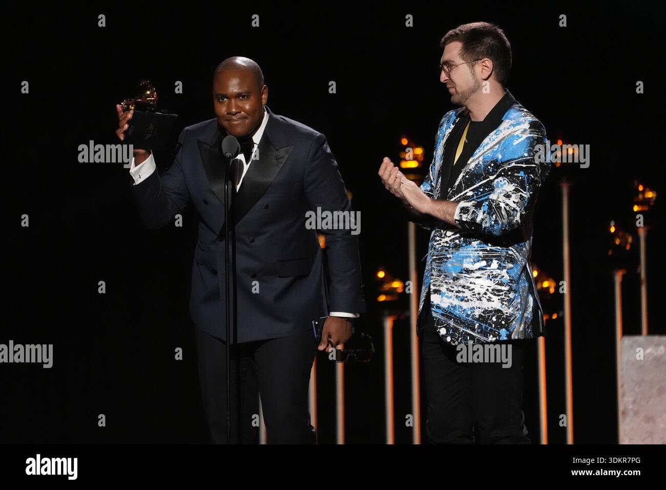 Bryan Carter, left, and Charlie Rosen accept the award for best ...