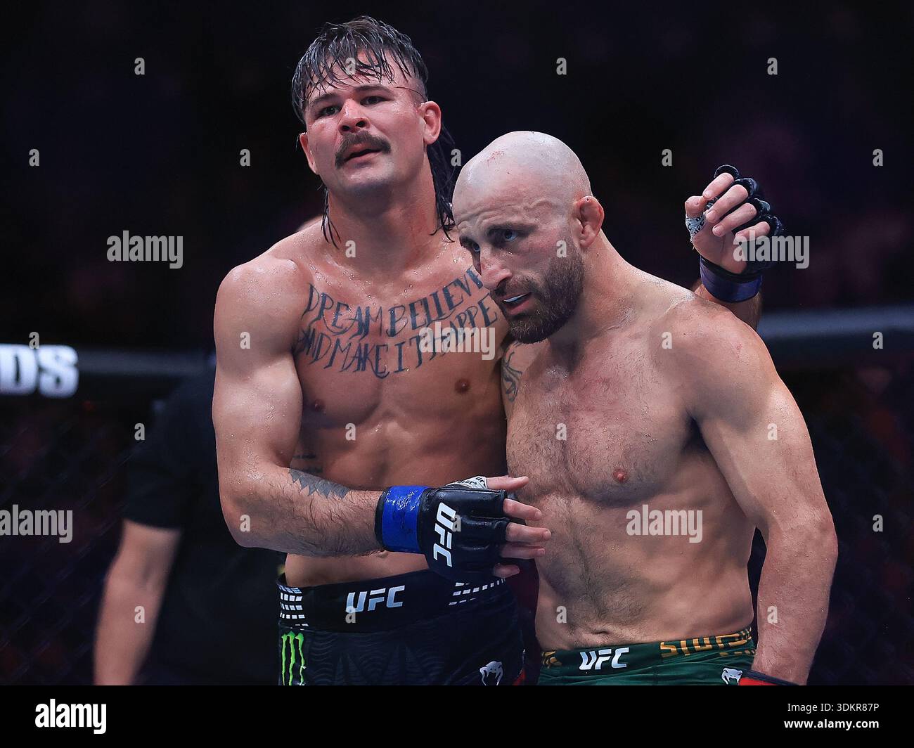 Australia's Alexander Volkanovski (R) and Brazil's Diego Lopes (L) seen ...