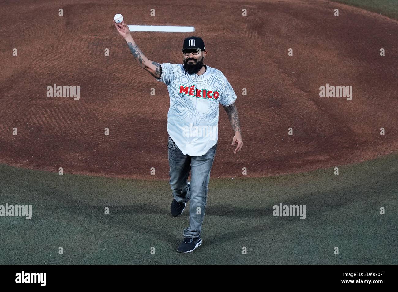 Mexican former professional baseball player Sergio Romo throws during ...