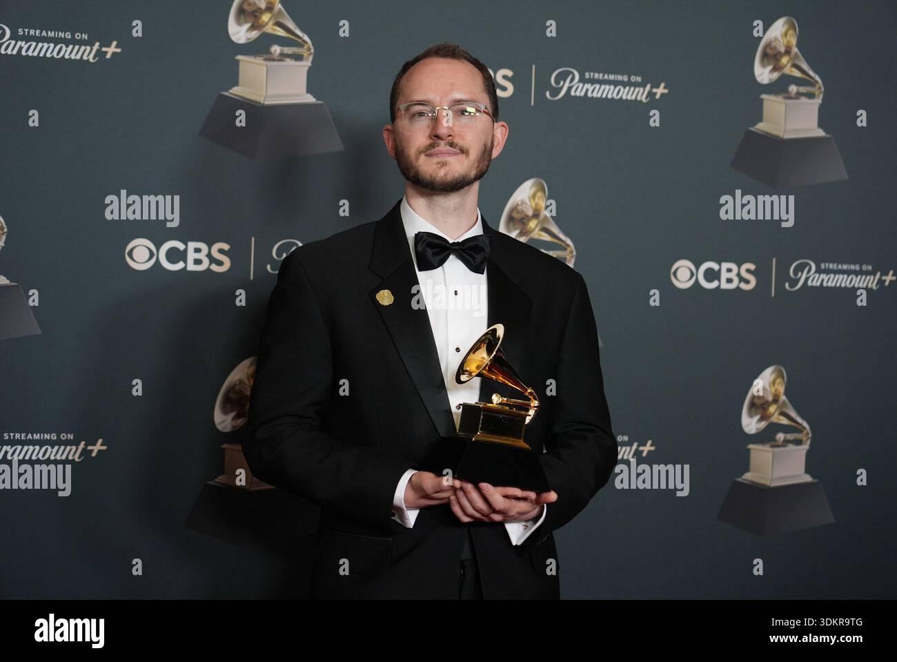 Remy Le Boeuf poses in the press room with the award for best ...