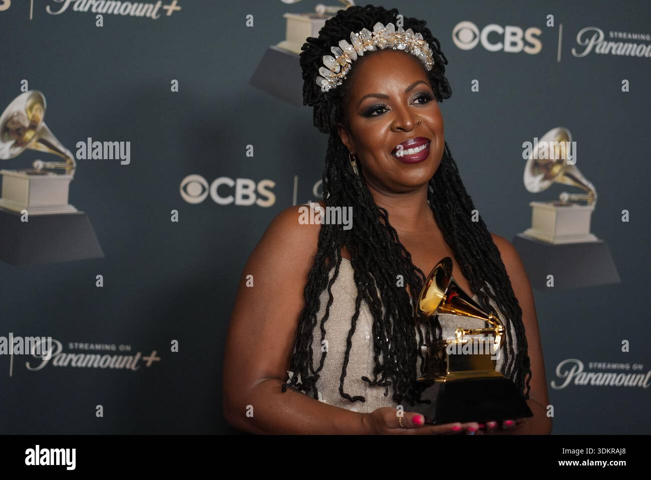 Johnaye Kendrick poses in the press room with the award for best ...