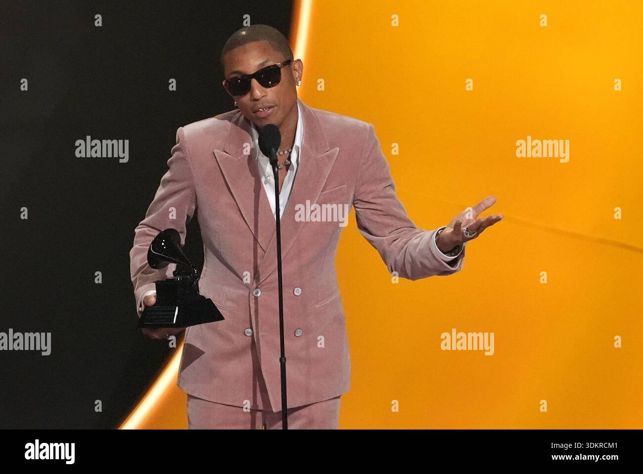 Pharrell Williams accepts the Dr. Dre Global Impact award to during the ...