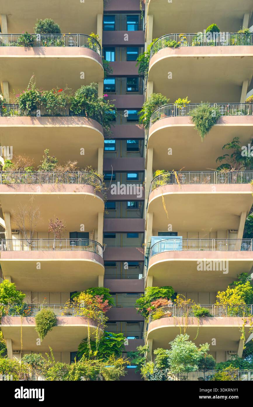 Vertical garden, green architecture. Residential building with lush ...