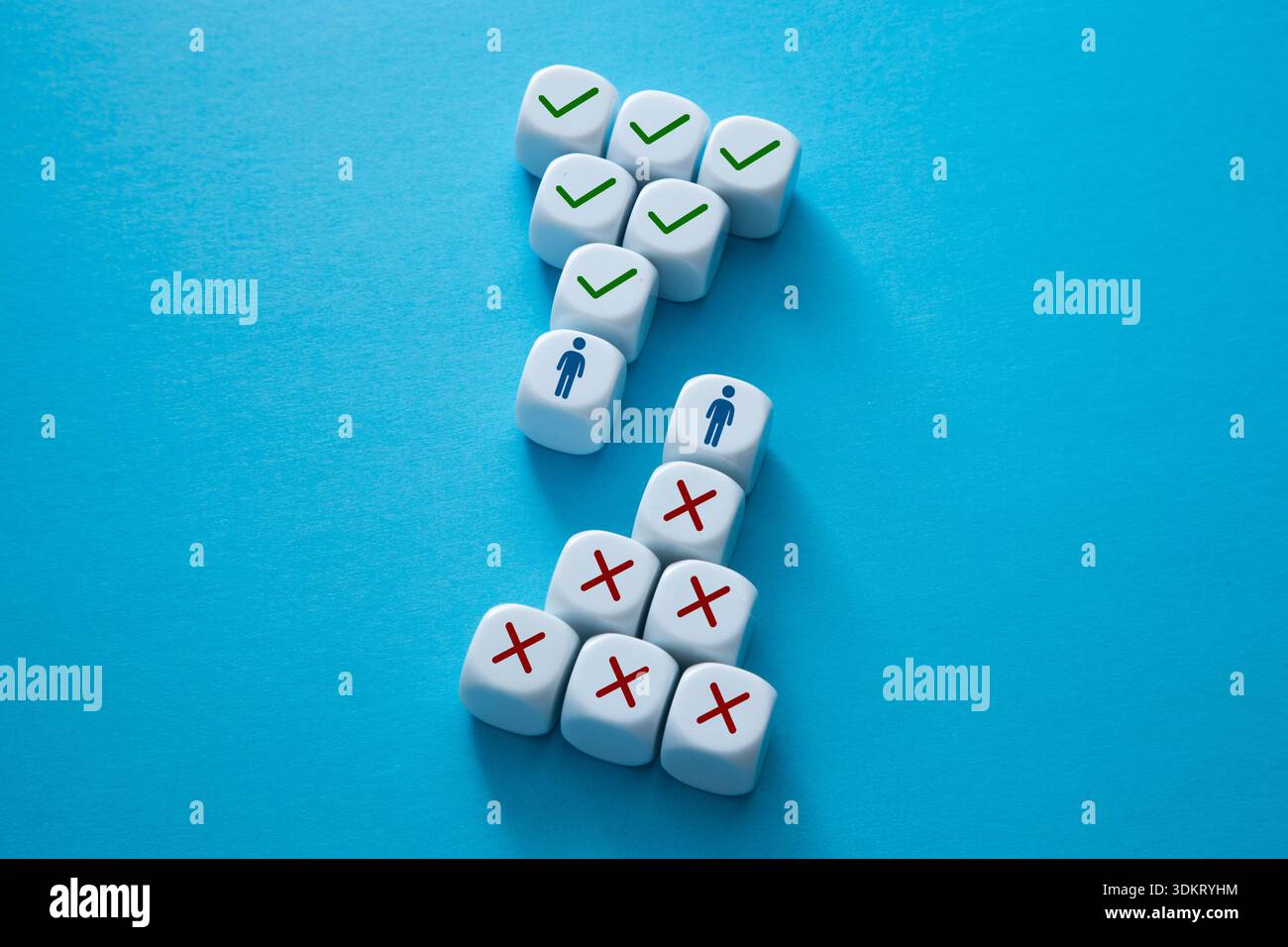 Cubes with check marks and crosses symbolize success and failure in ...