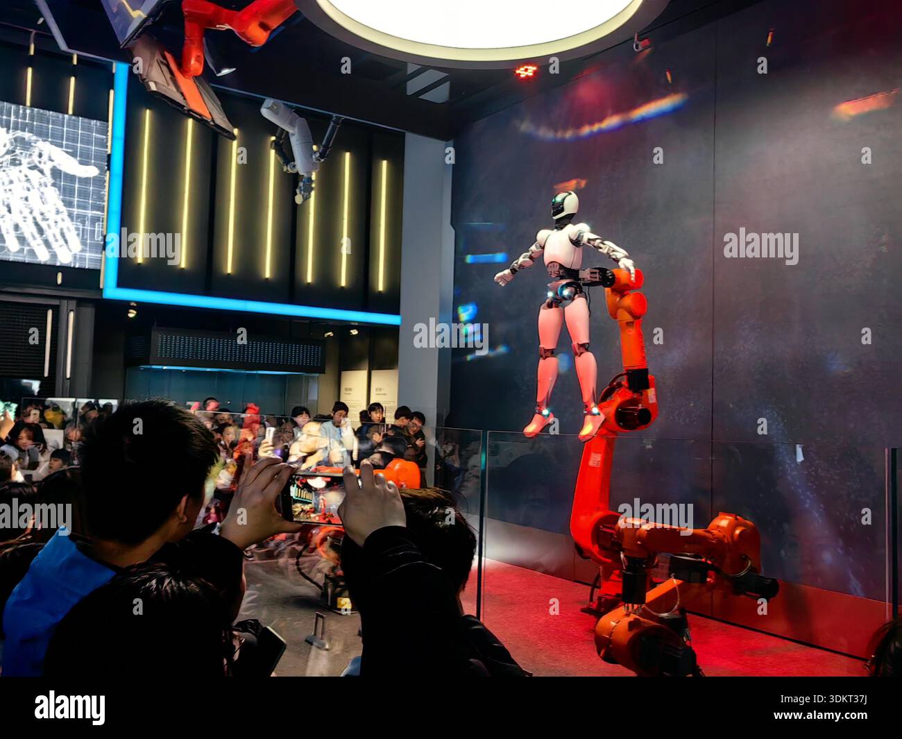 Visitors interact with exhibits at the renovated Shanghai Science and ...