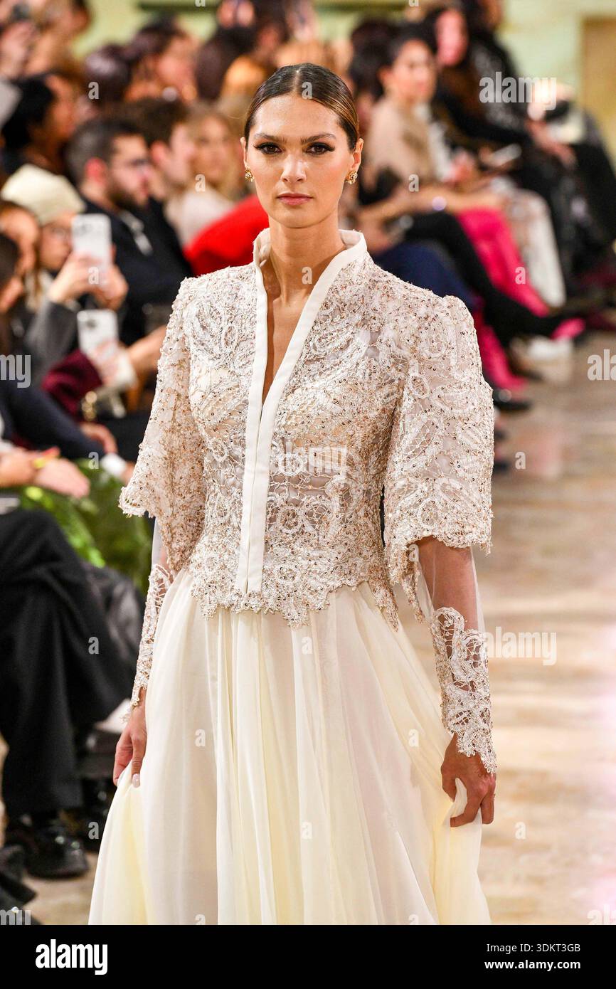 A model walks the runway during the Robert Abi Nader Haute Couture Week ...