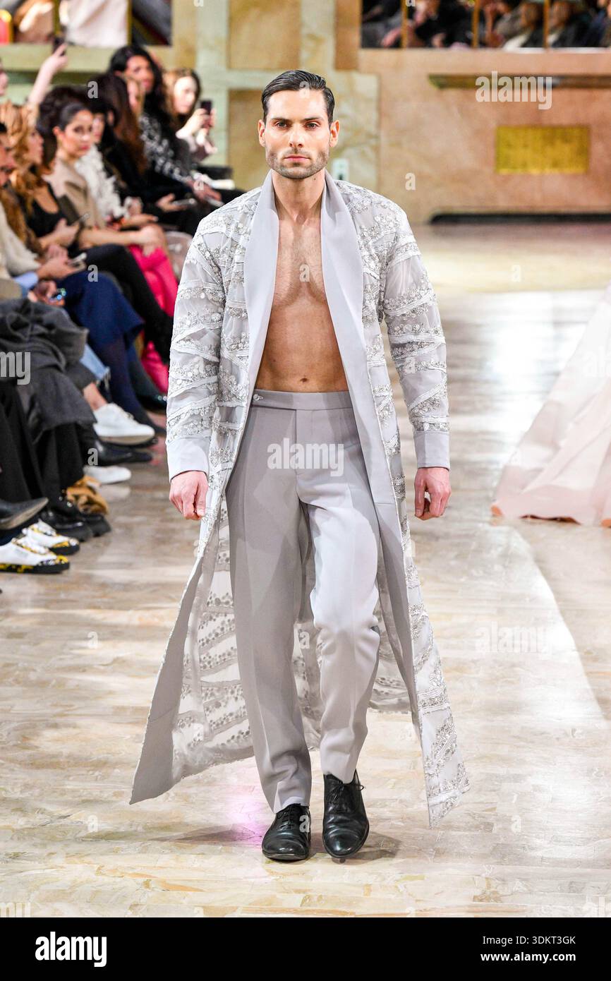 A model walks the runway during the Robert Abi Nader Haute Couture Week ...