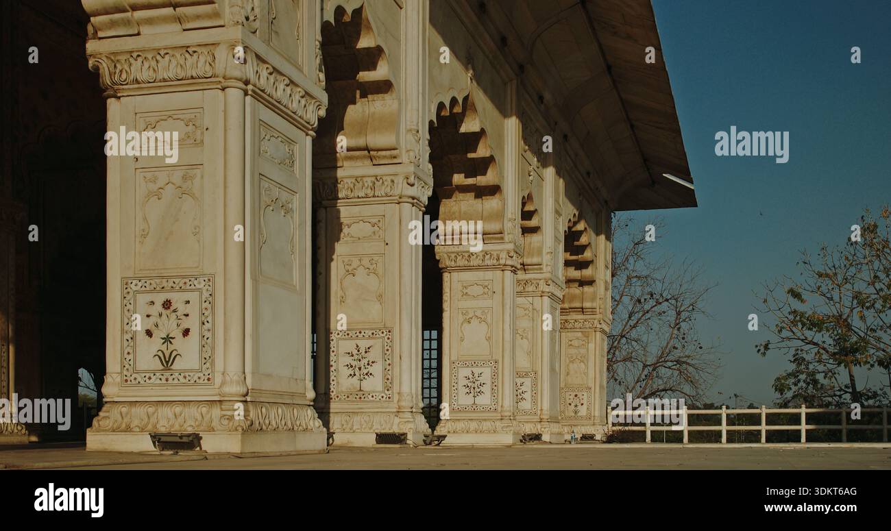 Red Fort Mughal arches and marble columns with dramatic shadow light ...