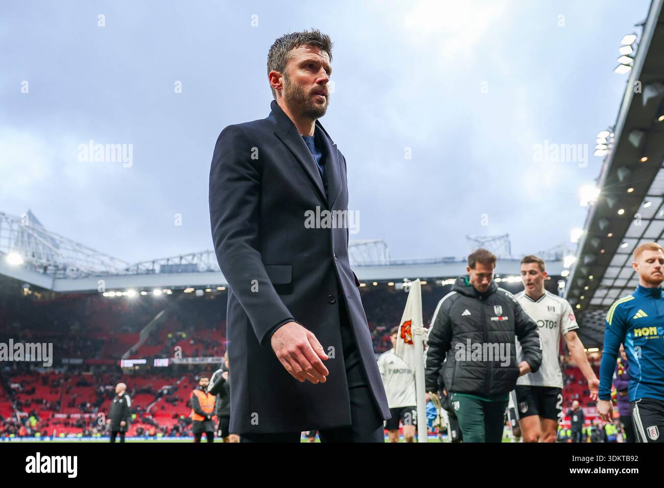 Manchester United head coach Michael Carrick leaves the pitch after ...
