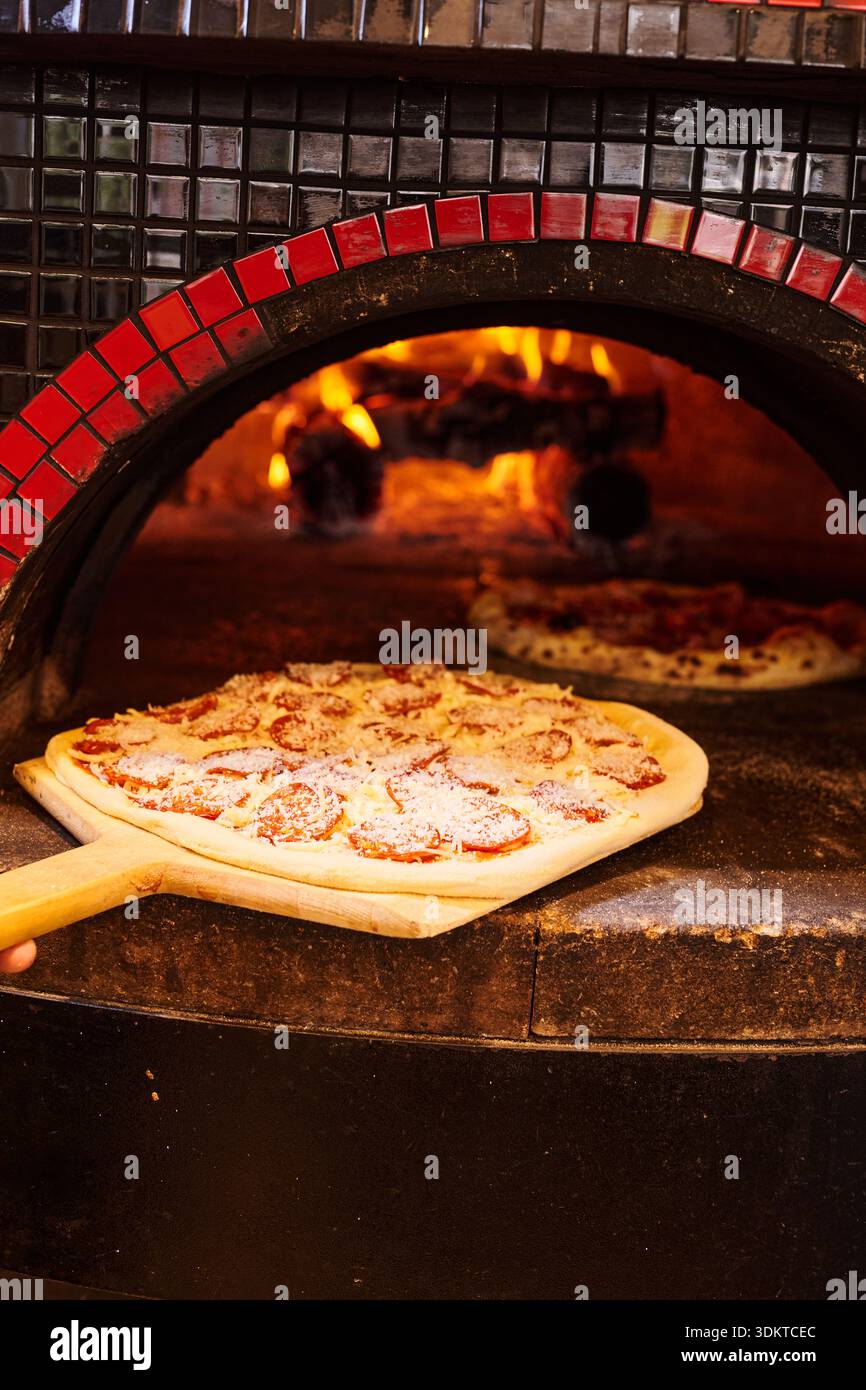 Artisan Pizza Baking and Serving Process Stock Photo - Alamy