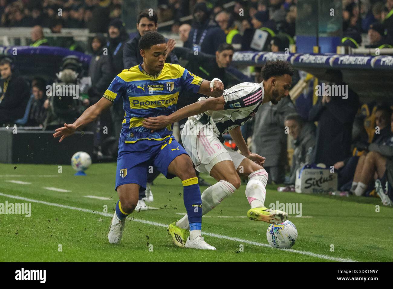 Juventus's Lloyd Kelly fights for the ball against Parma's Sascha ...