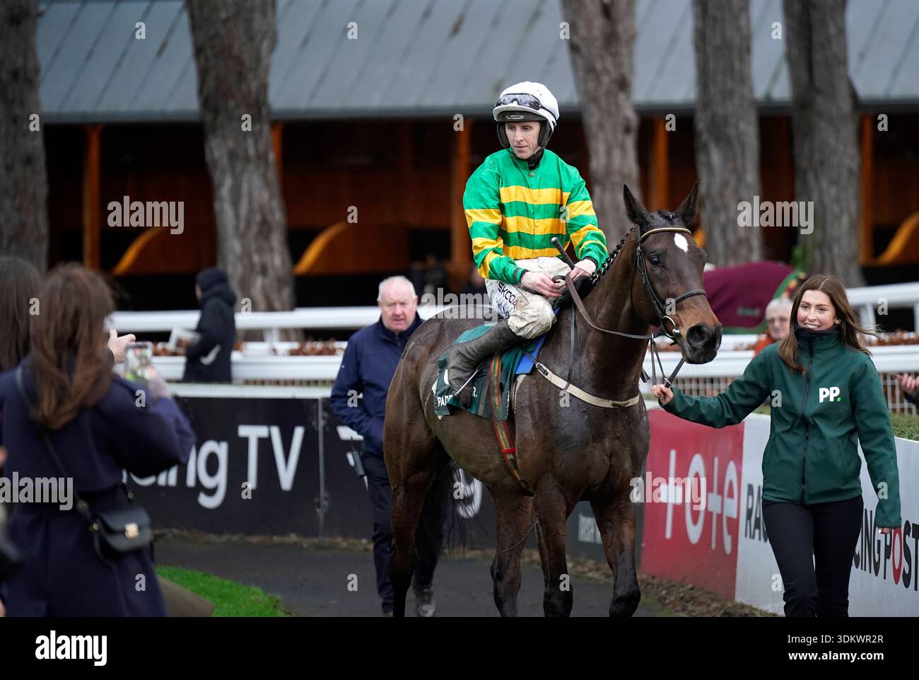 Mark Walsh after winning the Paddy Power Irish Gold Cup Chase with Fact ...
