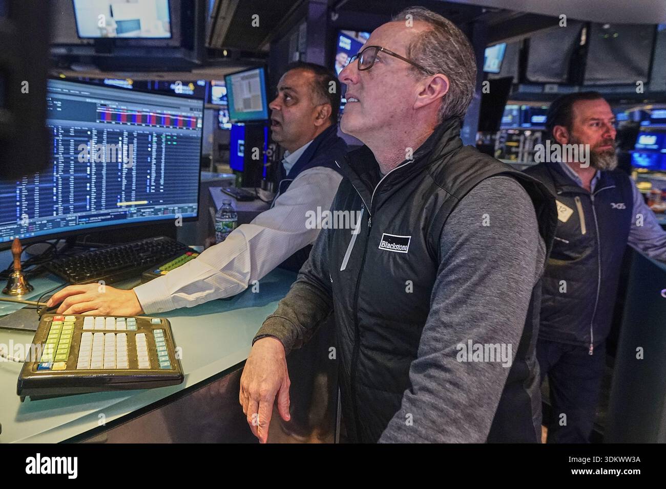 Specialists, from left, Dilip Patel, Glenn Carell, and Michael Pistillo ...