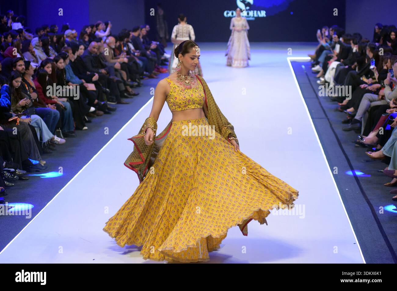 A model presents a creation by a Pakistani designer during LAAM Fashion ...