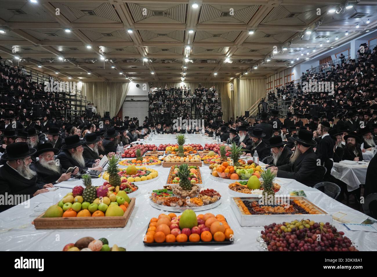 Ultra-Orthodox Jews from the Sanz Hasidic dynasty gather around long ...