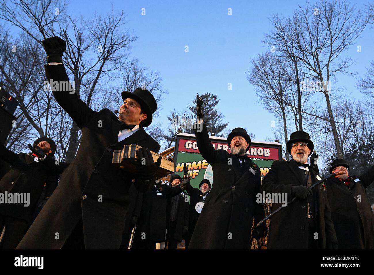 Groundhog Club members Dan McHinley, A.J. Dereume and Tom Dunkel wave ...
